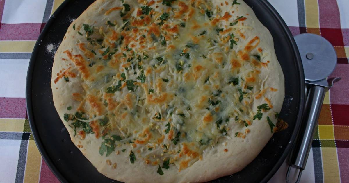 Pizza de ajo y perejil | Cocina y recetas fáciles